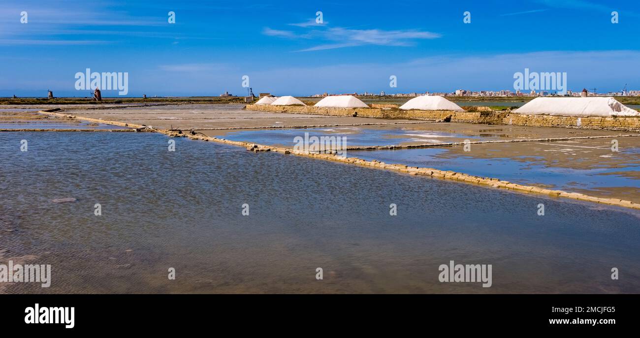 Panoramic view of piled salt and water basins in the Salina Culcasi at ...