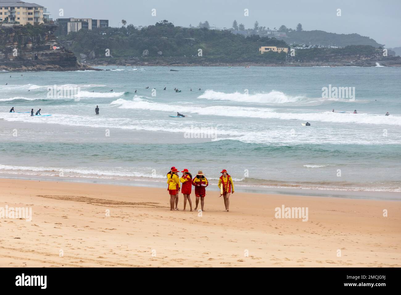 Female teenage girls volunteering as surf rescue staff on Manly Beach ...