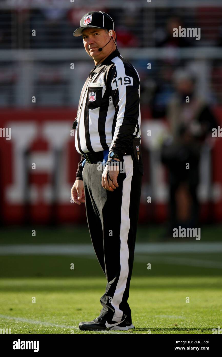 Back judge Greg Wilson (119) looks to the sideline during an NFL ...