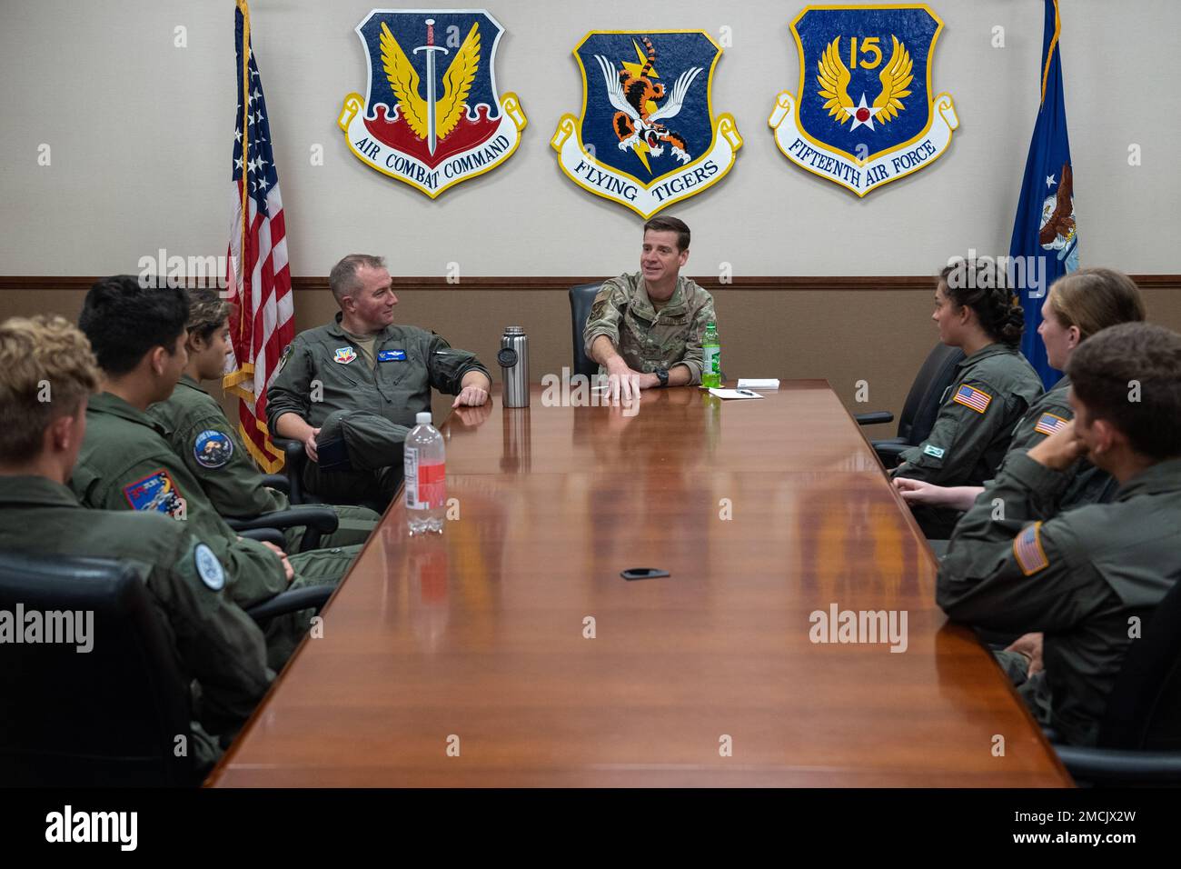 U.S. Air Force Col. Russ Cook, 23rd Wing commander, center, speaks to U ...