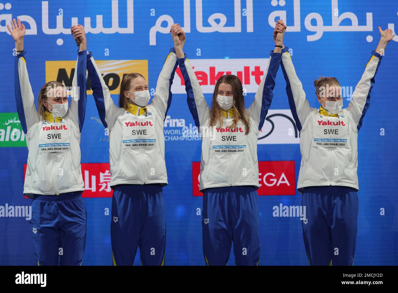 Team Sweden stands on the podium after winning the 4x100 medley relay ...