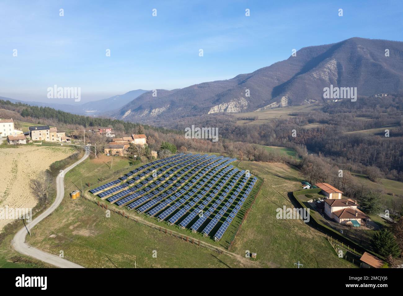 Solar cell photovoltaic panel in country landscape against sunny sky ...