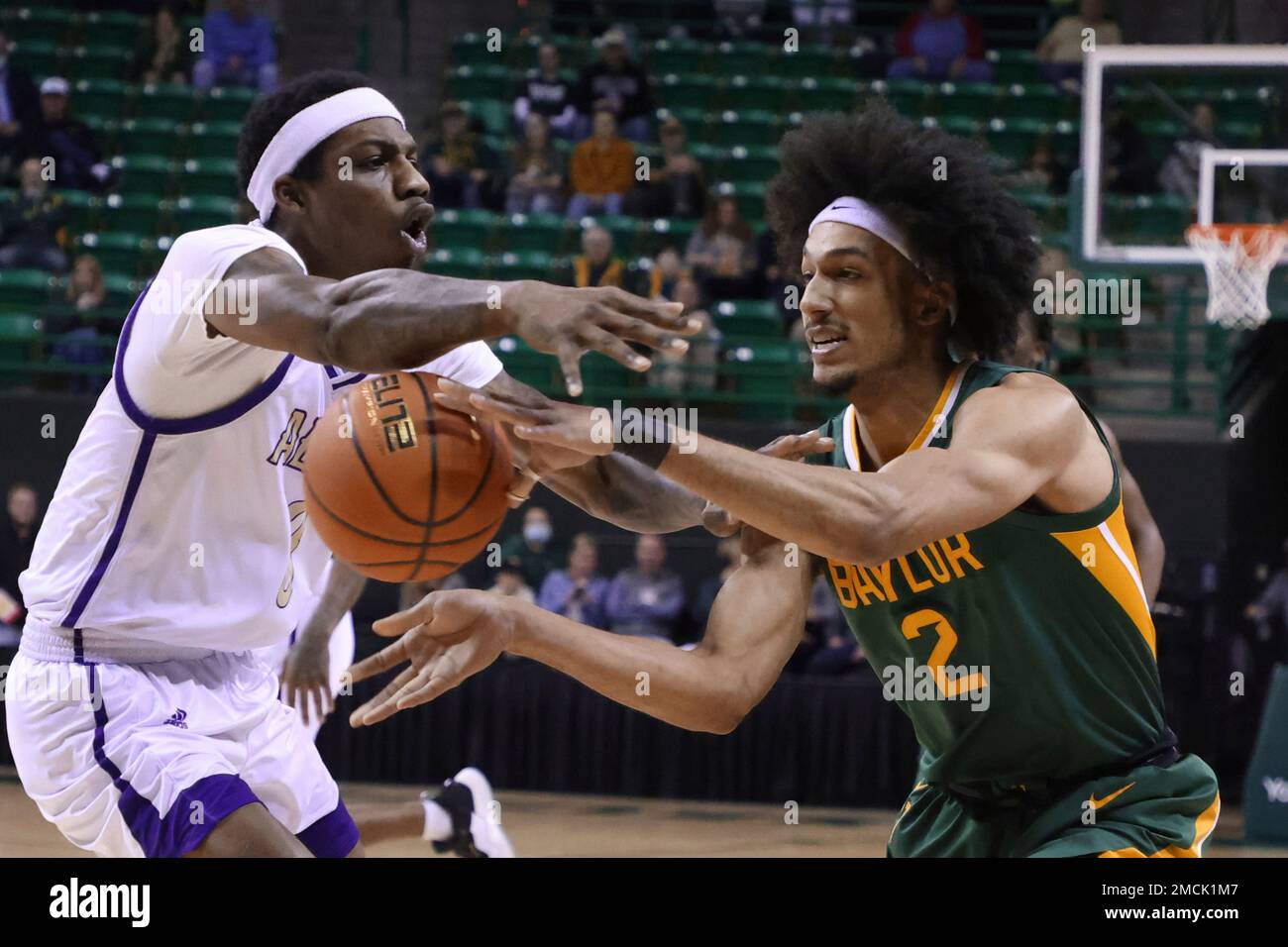 Baylor guard Kendall Brown, right, is guard by Alcorn State center ...