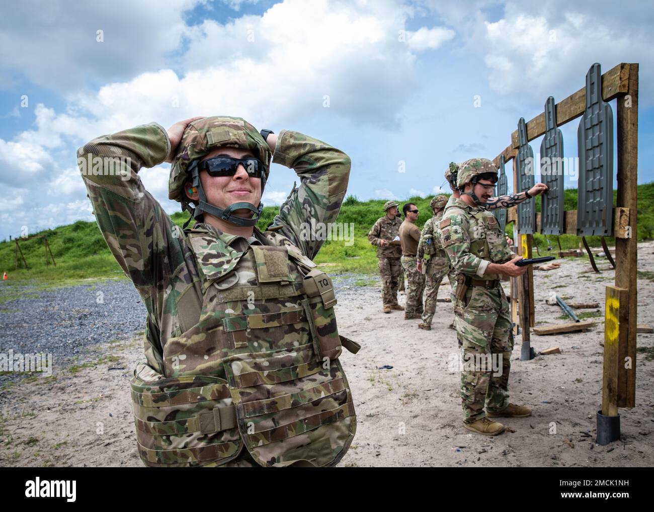 U.S. Air Force Cpt. Elizabeth Fantini examines her target during the ...