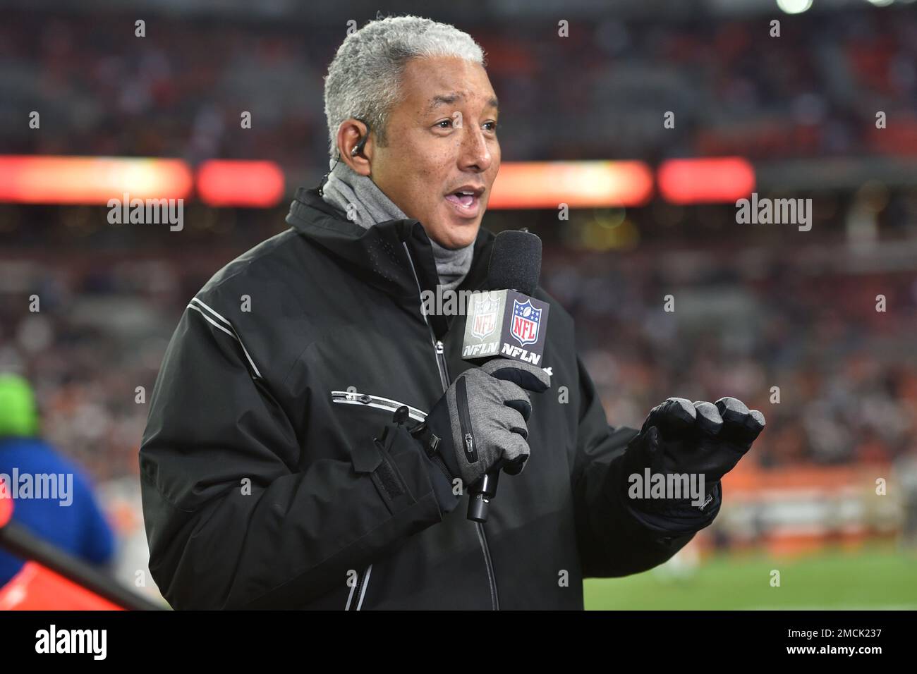 NFL Network's Steve Wyche works on the sideline during the first half ...