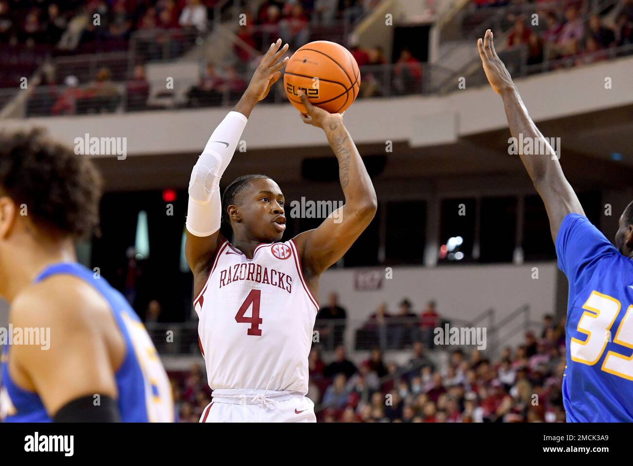 Arkansas guard Davonte Davis (4) shoots against Hofstra during an NCAA college basketball game ...