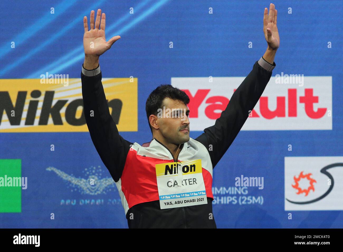 Dylan Carter of Trinidad and Tobago stands on the podium after winning ...