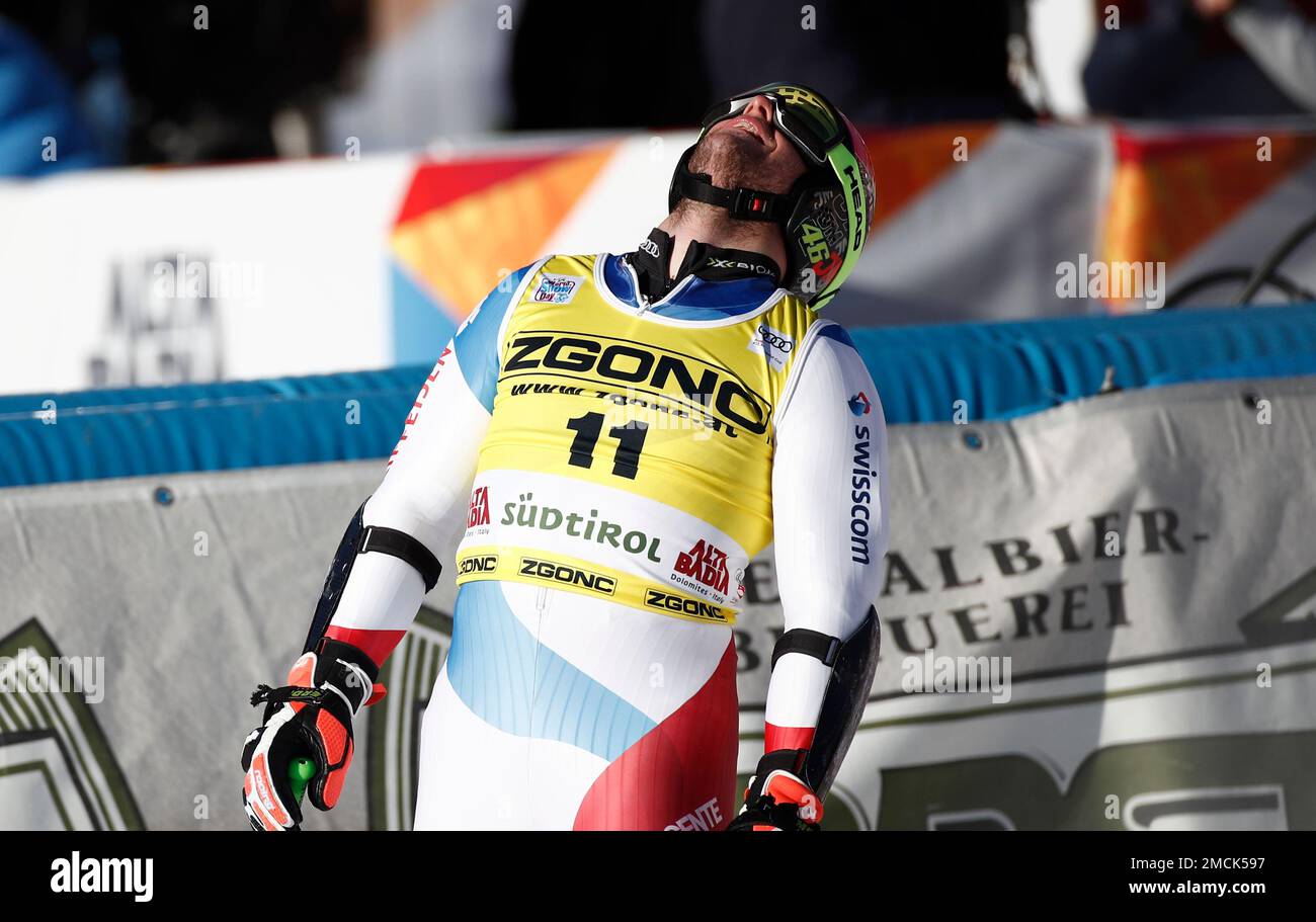 Switzerland's Justin Murisier reacts at finish area after completing an ...