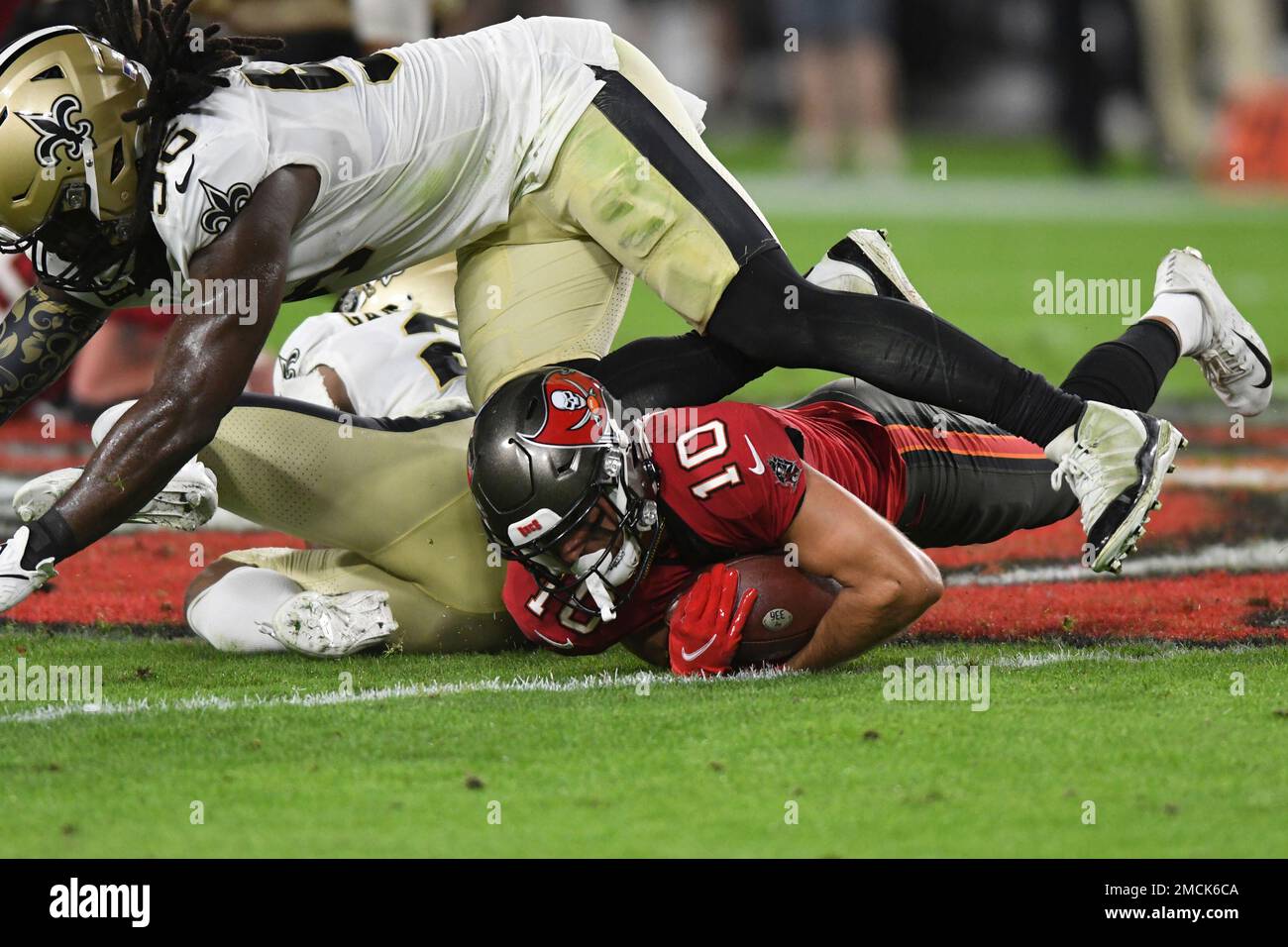 Tampa Bay Buccaneers wide receiver Scott Miller (10) is stopped by New ...
