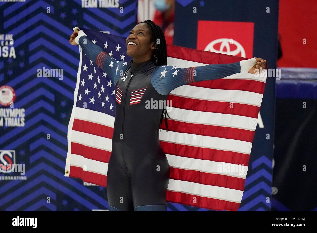 Maame Biney poses with a United States flag after the new members of ...