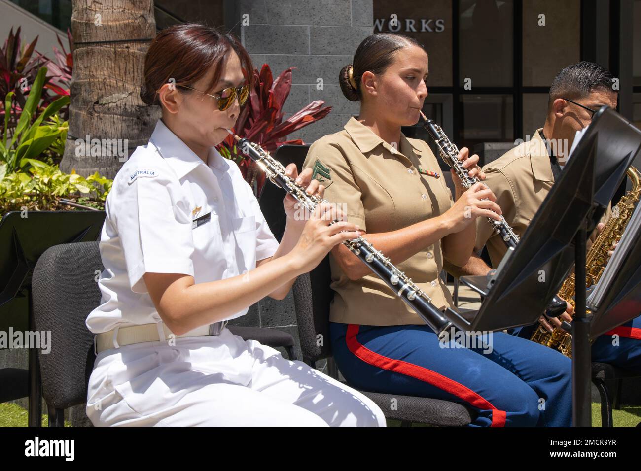 U.S. Marine Corps Cpl. Ashley Cook, right, clarinet instrumentalist, U ...