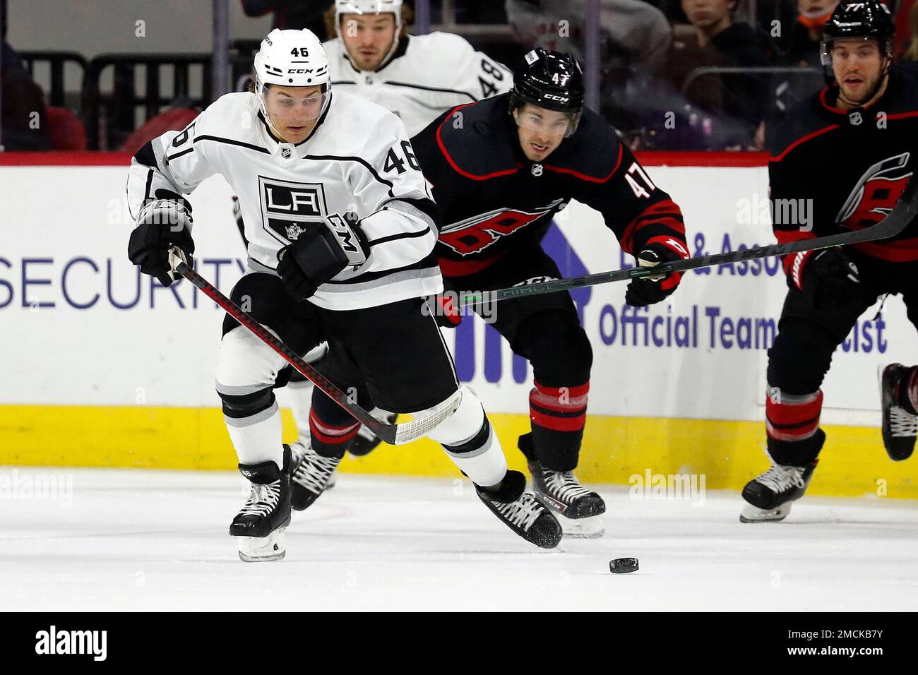 Los Angeles Kings' Blake Lizotte (46) brings the puck up the ice after ...