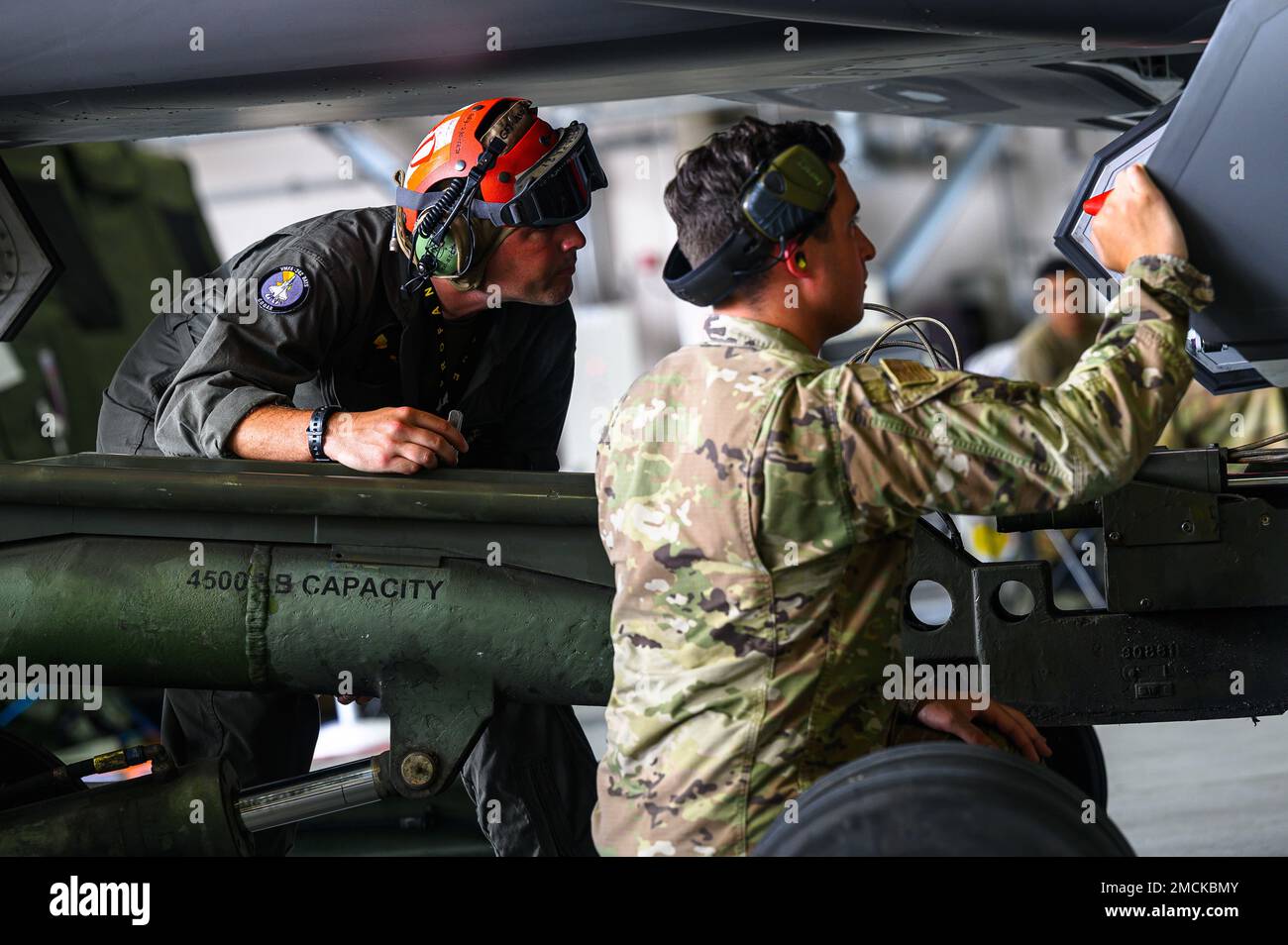A U.S. Marine assigned to Marine Fighter Attack Squadron (VMFA) 242 and ...