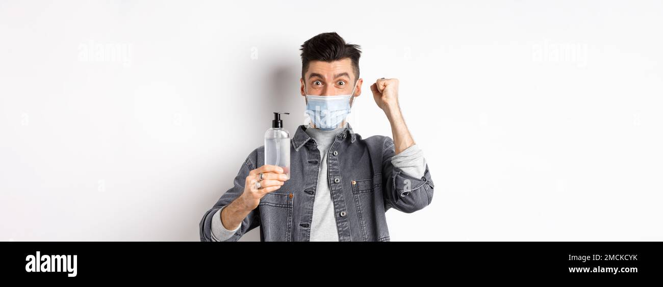 Health, covid and pandemic concept. Happy guy motivated to get rid from ...
