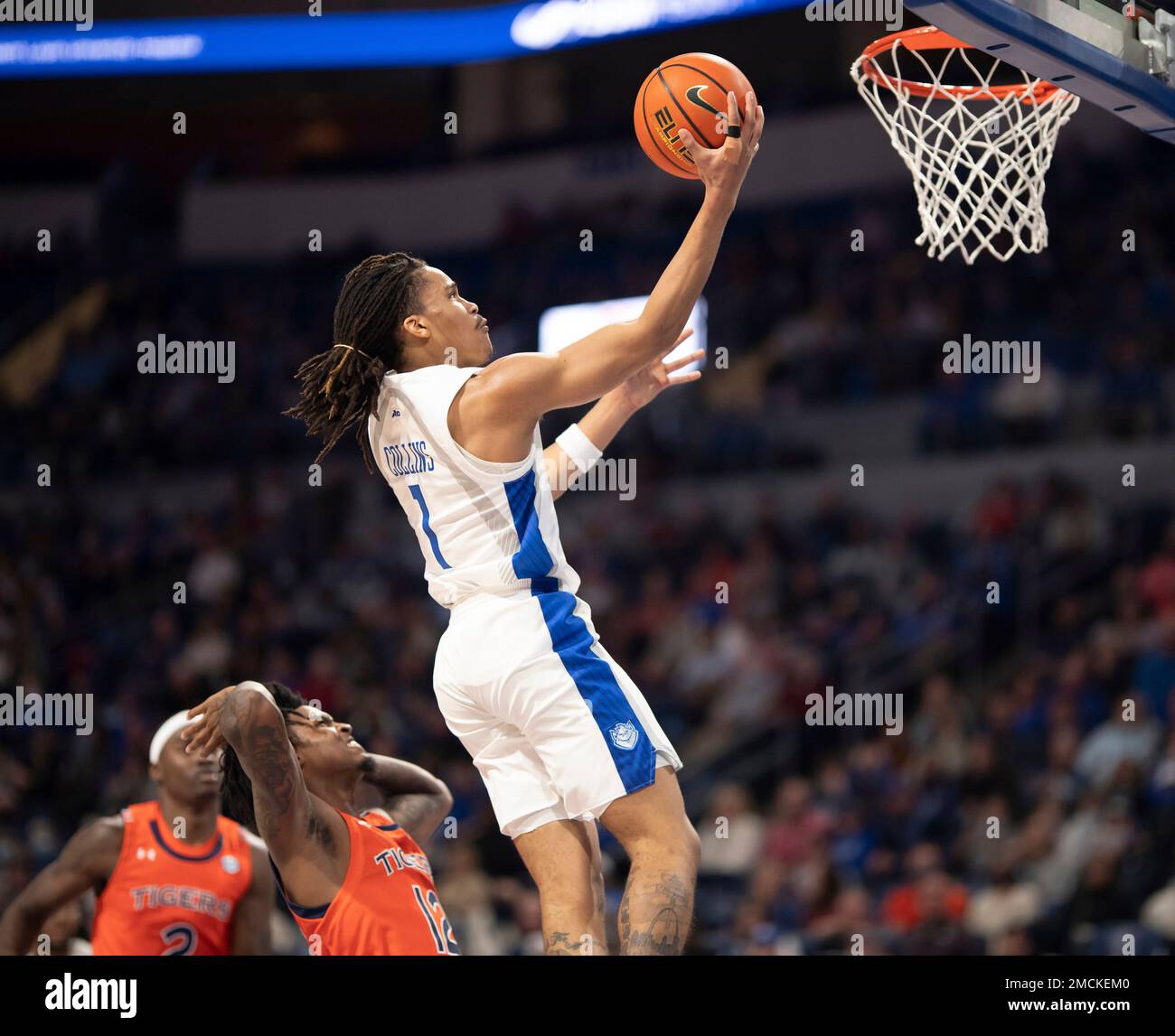 Saint Louis guard Yuri Collins (1) scores a layup during the first half ...