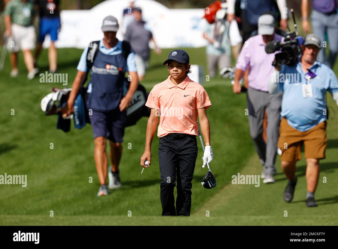 Charlie Woods walks to second tee box during the first round of the PC ...