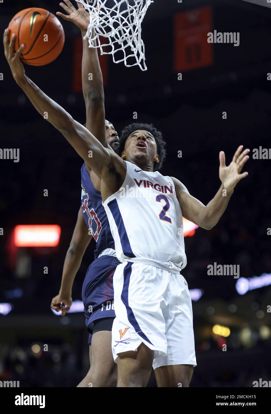 Virginia guard Reece Beekman (2) shoots in front of Fairleigh Dickinson ...