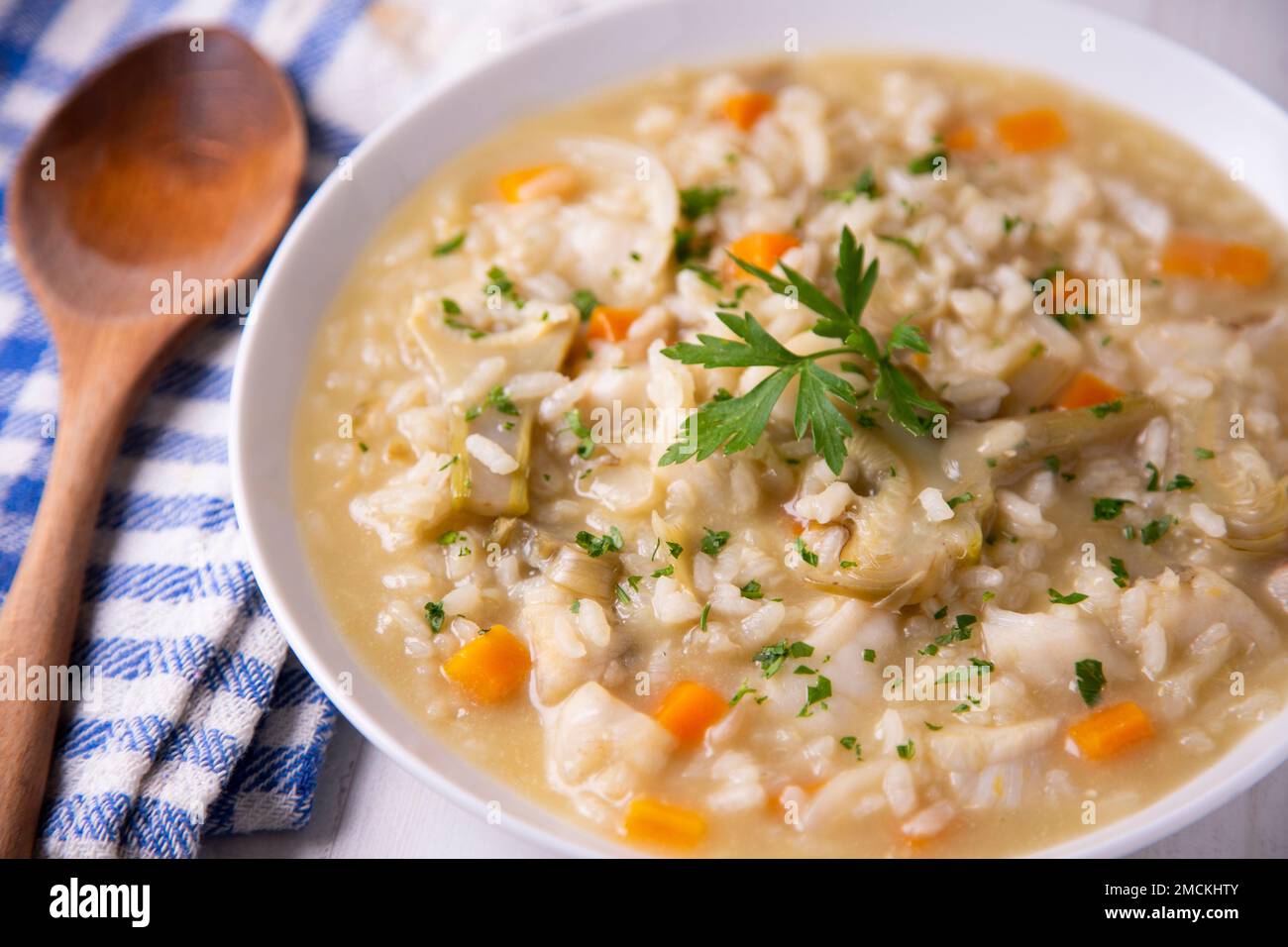 Original spanish soupy rice recipe with chicken and vegetables Stock ...