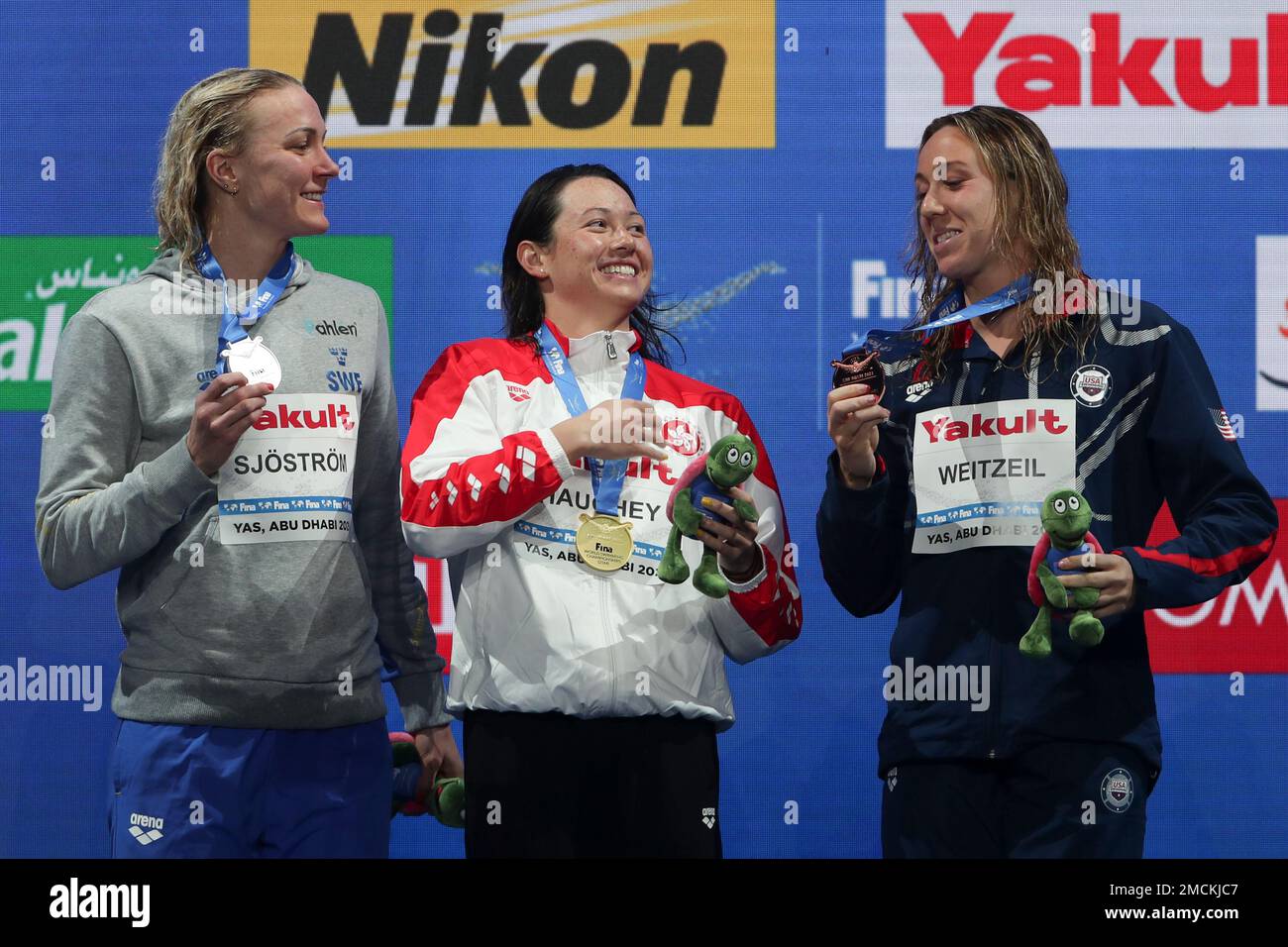 From the left, Sarah Shostrom of Sweden, silver, Siobhan Bernadette Haughey of Hong Kong, gold ...