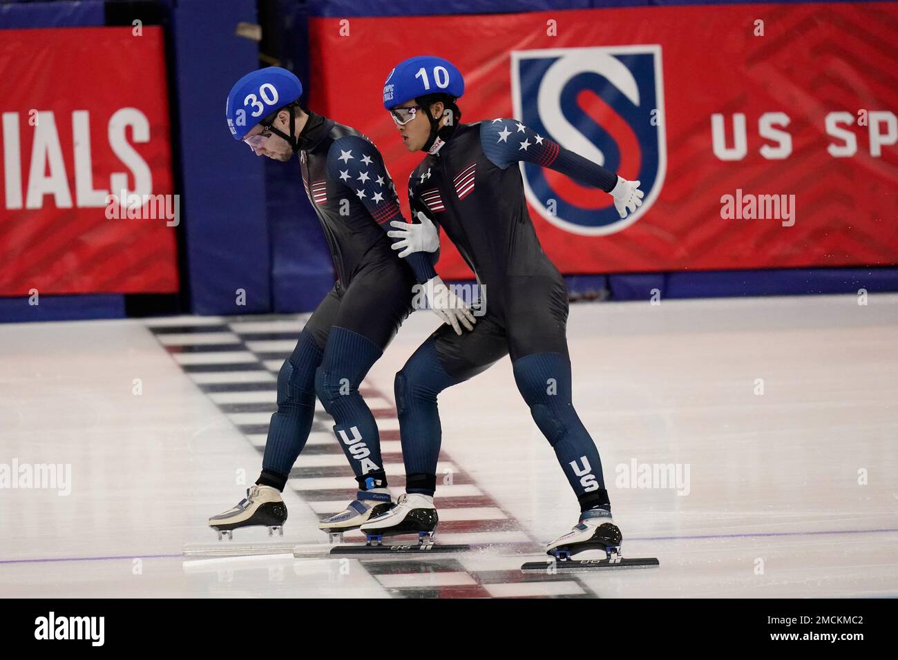 Ryan Pivirotto (30) and Andrew Heo (10) battle at the finish line while ...