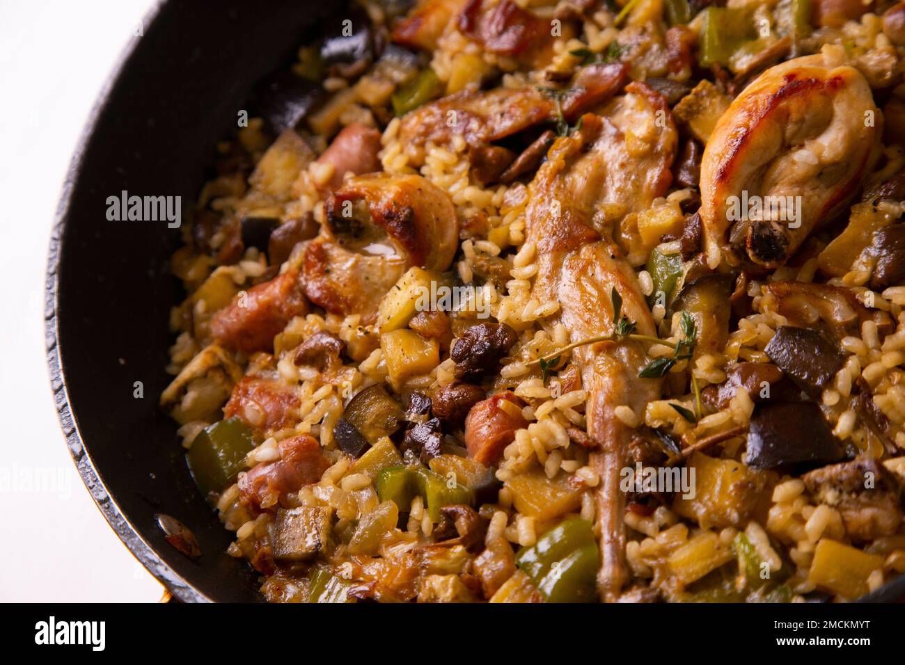 Original spanish paella recipe with rabbit, pork and vegetables Stock ...
