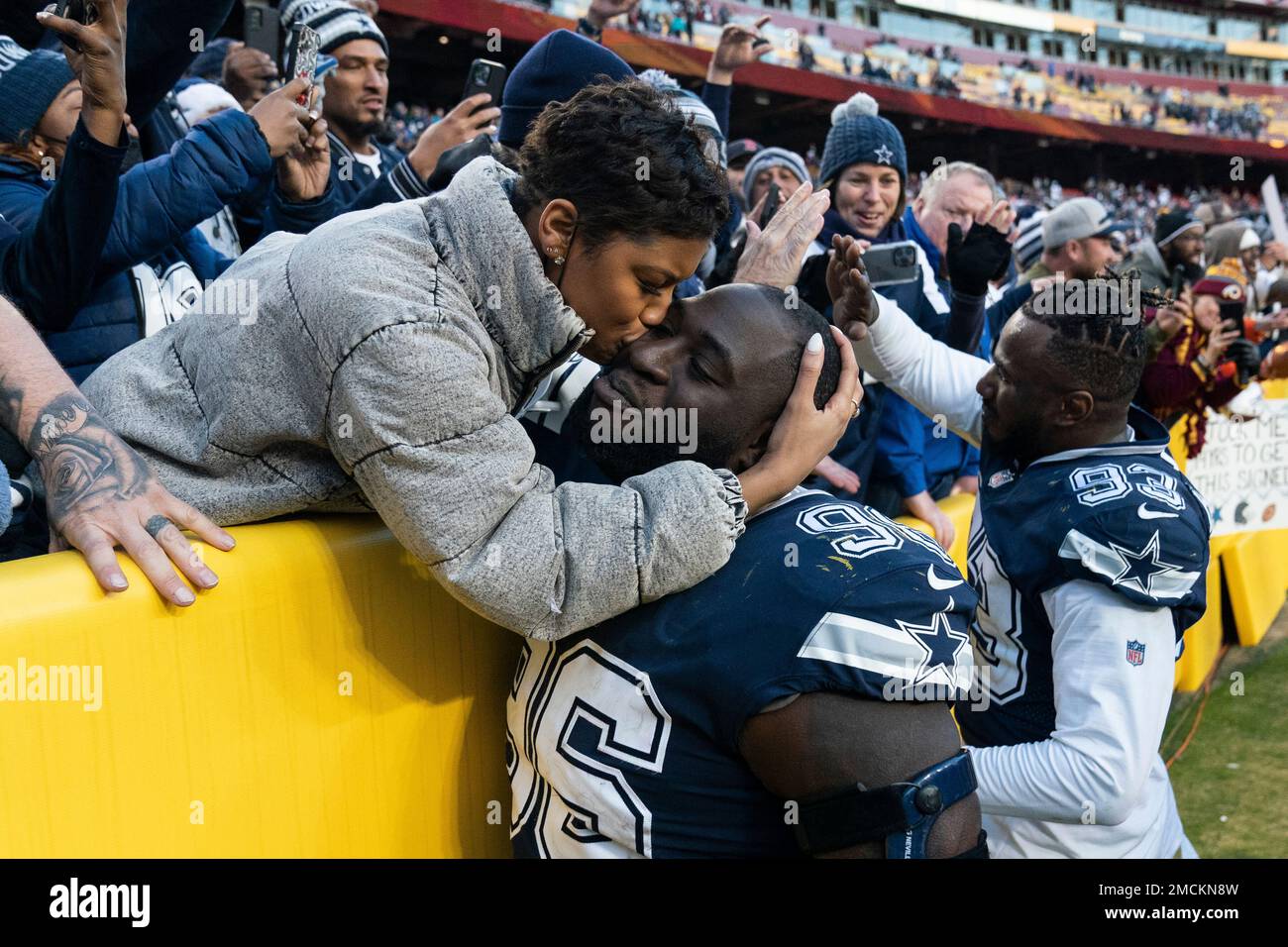 Dallas Cowboys defensive tackle Neville Gallimore (96) gets a kiss ...