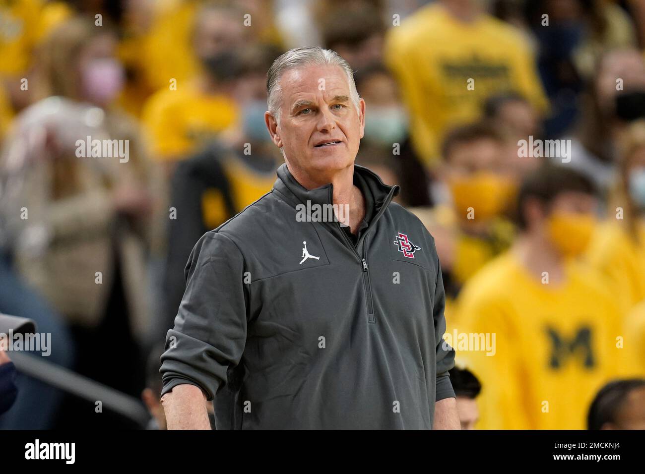 San Diego State head coach Brian Dutcher watches against Michigan in ...