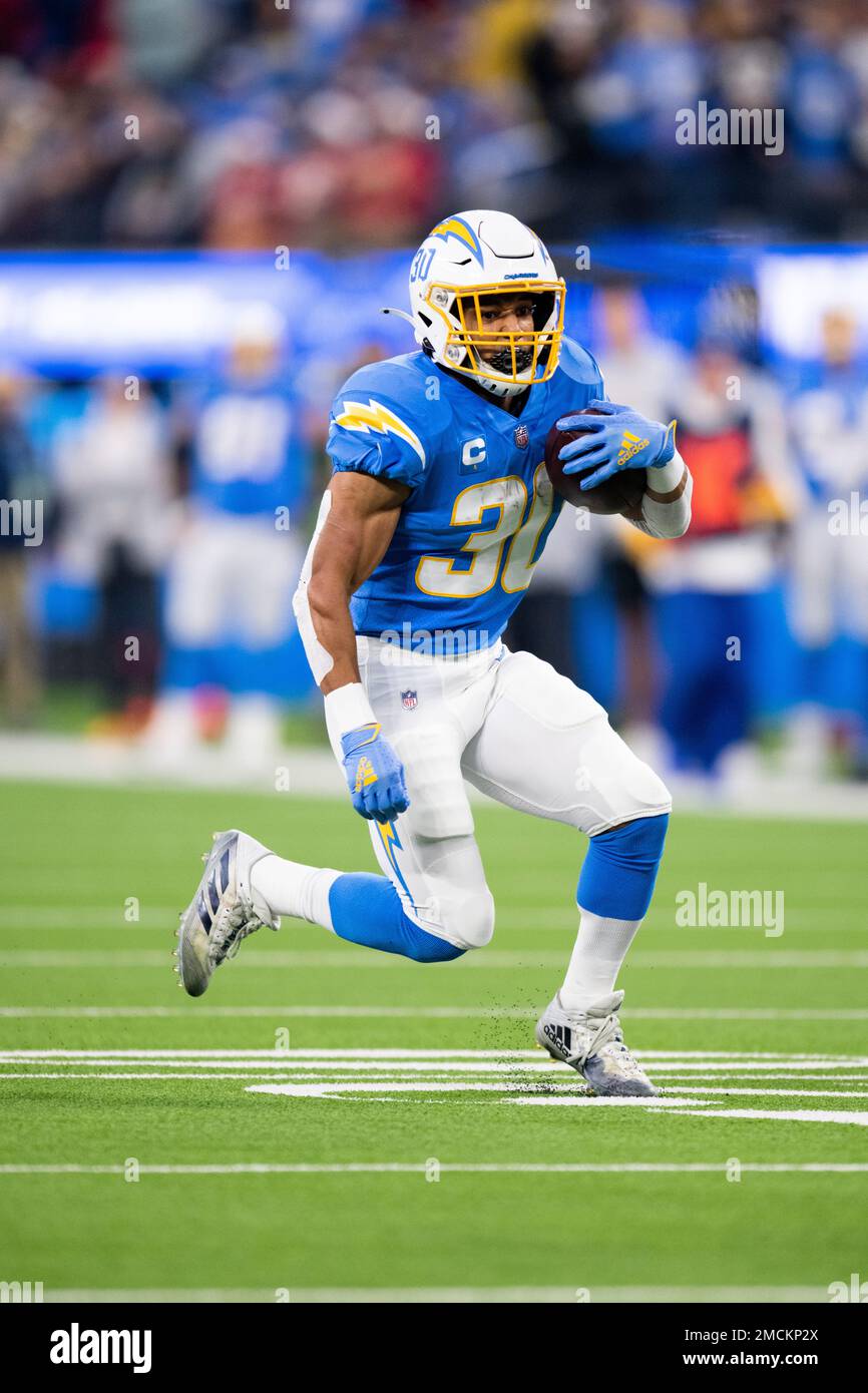 Los Angeles Chargers running back Austin Ekeler (30) runs with the ball ...