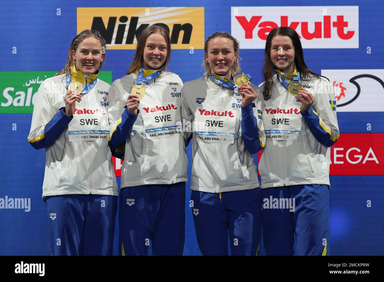 Team Sweden swimmers react after winning women's 4x50 medley relay ...
