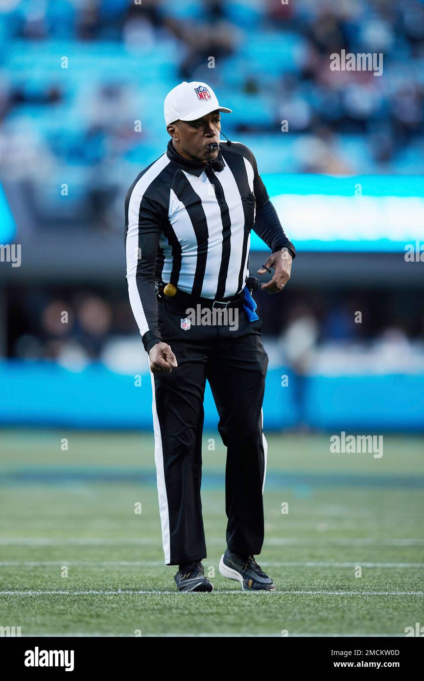 Referee Shawn Smith (14) works the NFL football game between the ...