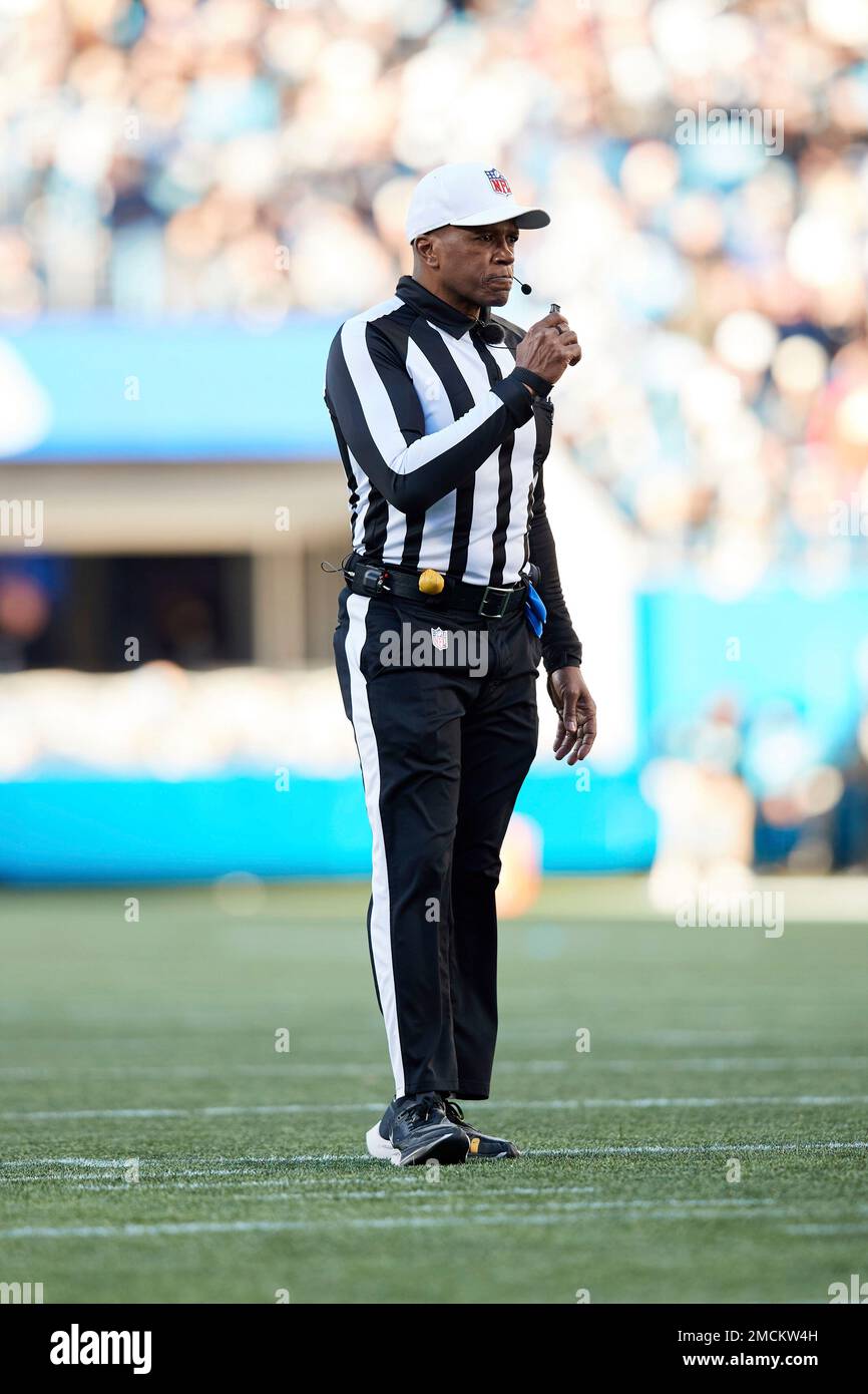 Referee Shawn Smith (14) works the NFL football game between the ...
