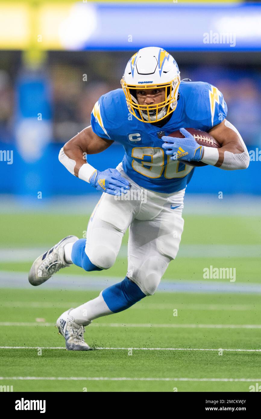 Los Angeles Chargers running back Austin Ekeler (30) runs with the ball ...