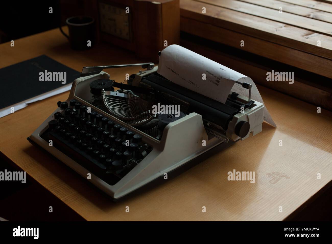 Old retro vintage typewriter on the wooden table in the office Stock ...