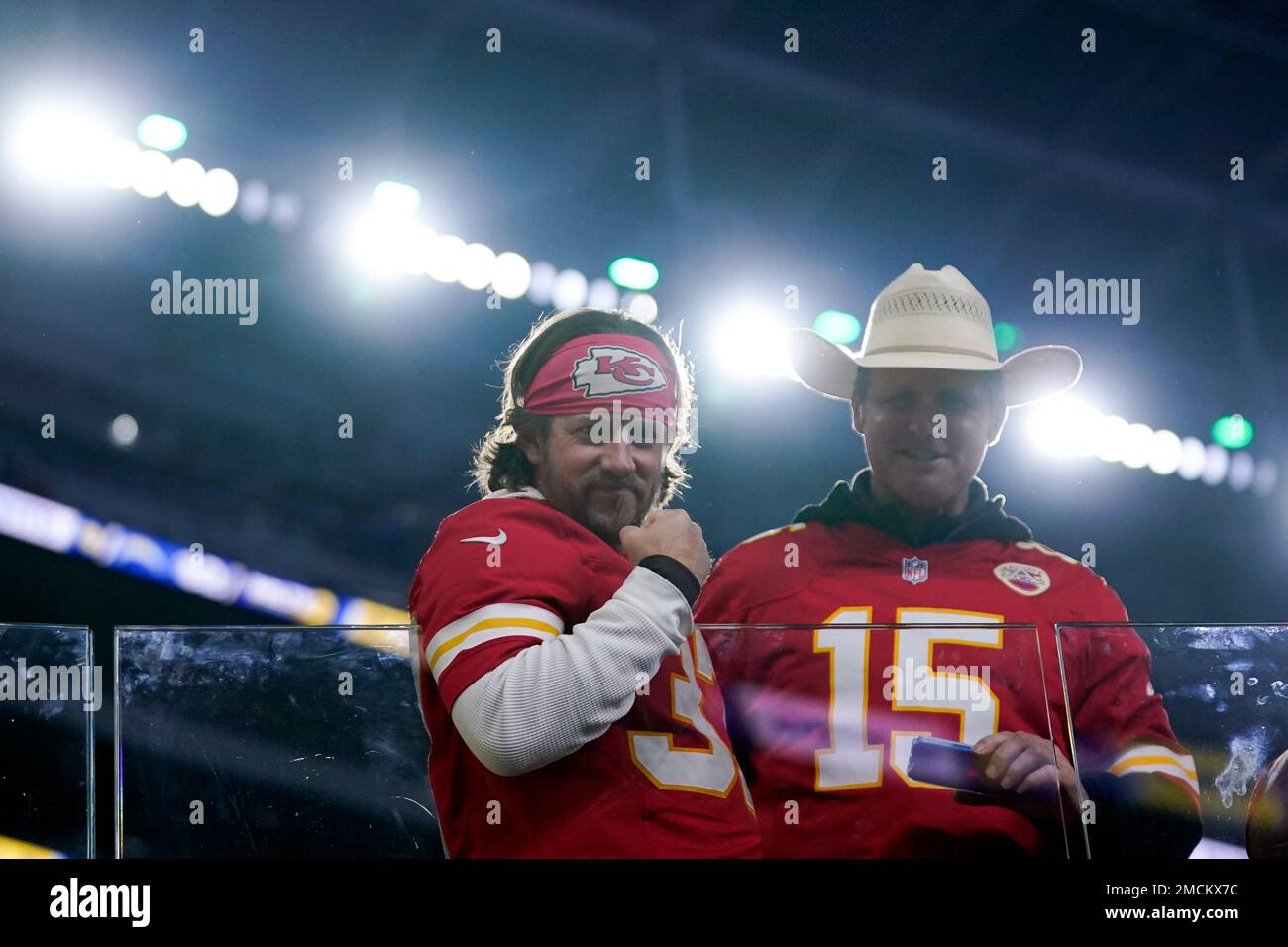 Kansas City Chiefs fans look on before an NFL football game against the ...
