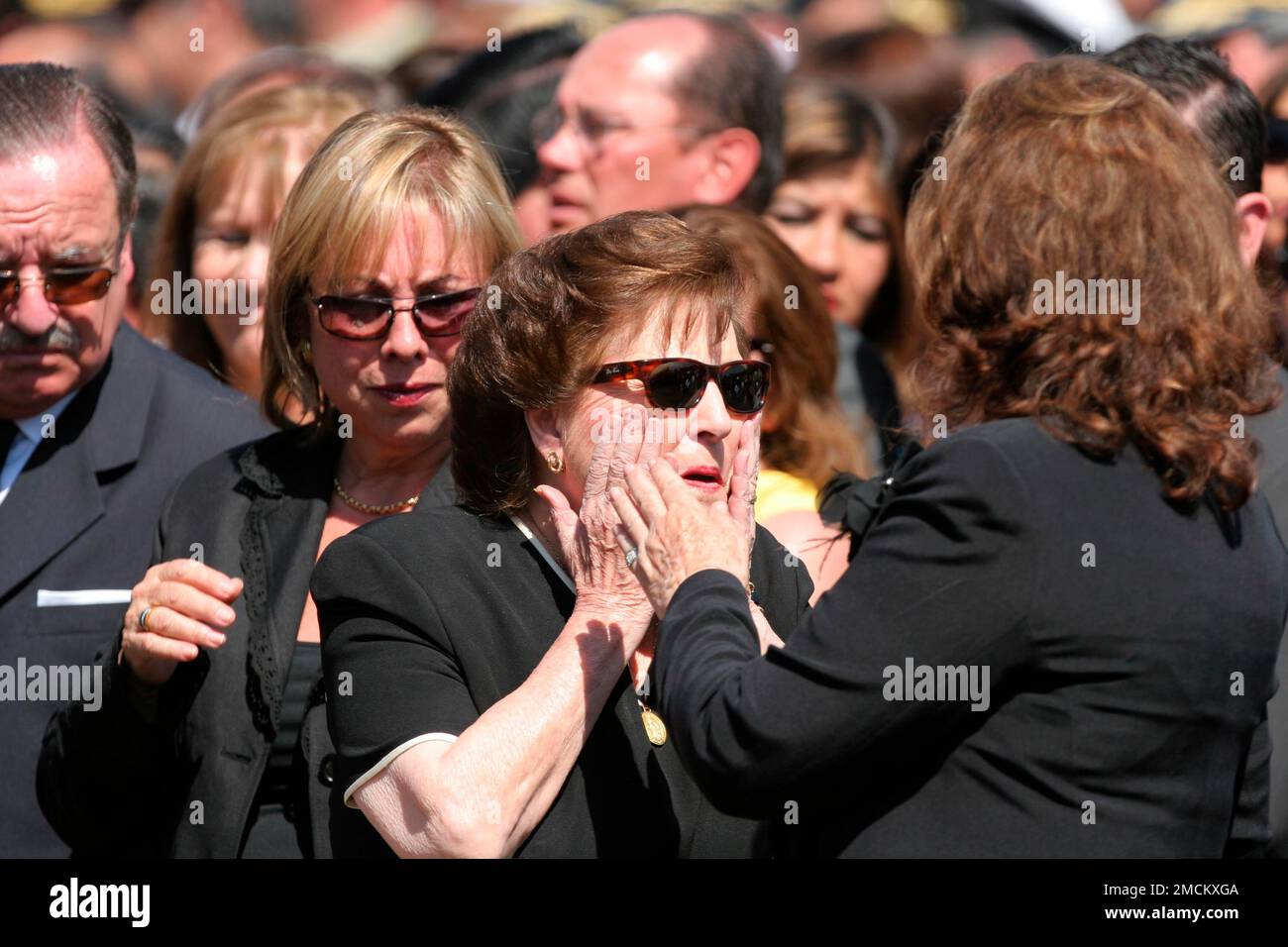 FILE - Lucia Hiriart de Pinochet, center, and her daughter Lucia are ...