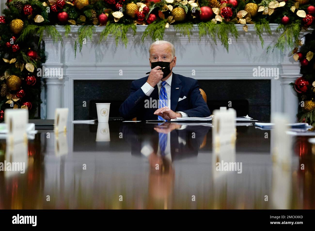 President Joe Biden speaks as he meets with members of the White House ...