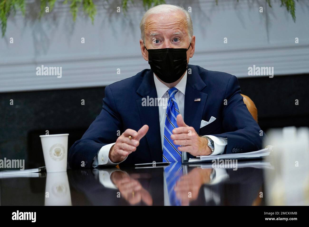 President Joe Biden speaks as he meets with members of the White House ...