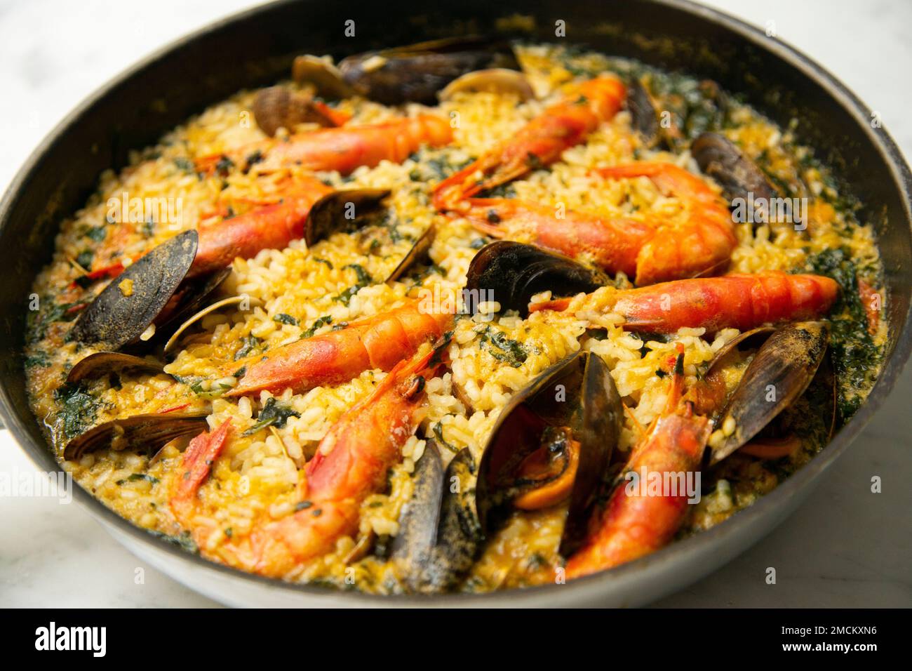 Seafood paella with mussels, prawns and clams. Authentic Paella spanish ...