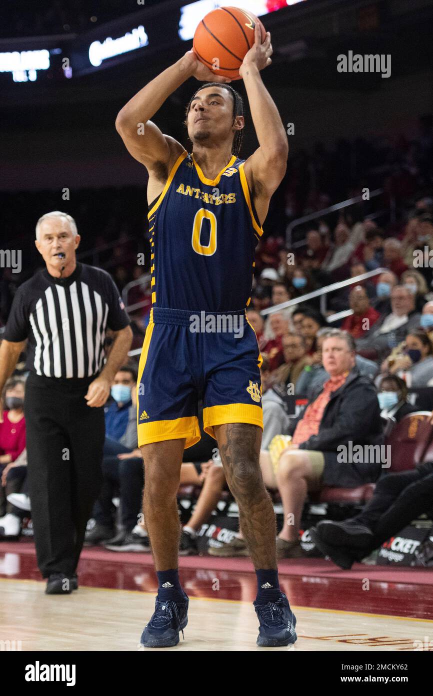 UC Irvine forward JC Butler (0) shoots during an NCAA college ...