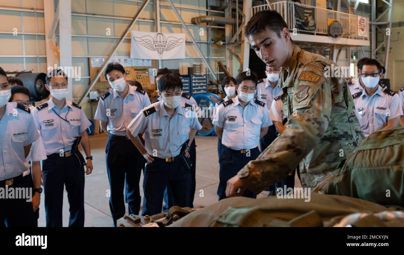 U.S. Air Force Airman Antonio Lopez-Testini (front), 374th Logistics ...