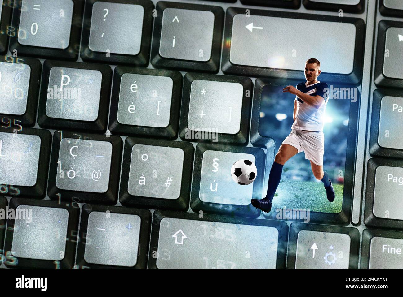 Football player exits from a computer keyboard as soccer streaming ...