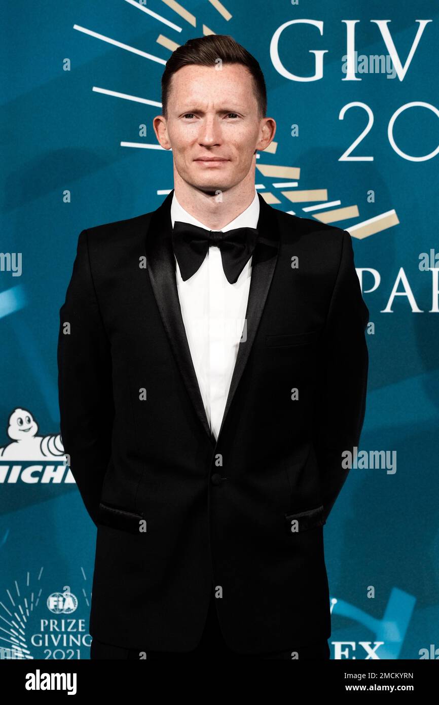 Driver Mike Conway of Britain poses as he arrives at the FIA Prize ...