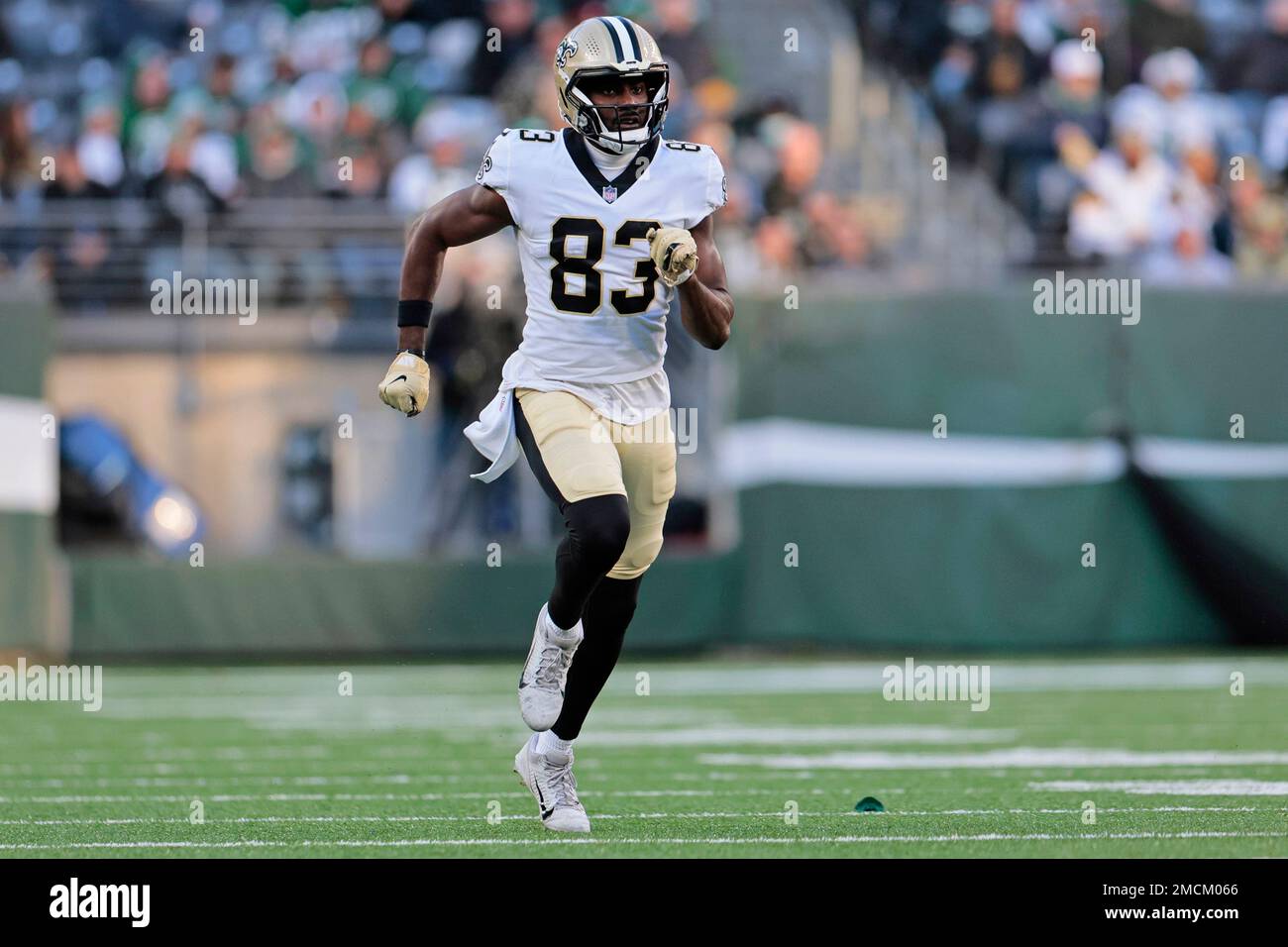 New Orleans Saints tight end Juwan Johnson (83) runs during an NFL ...