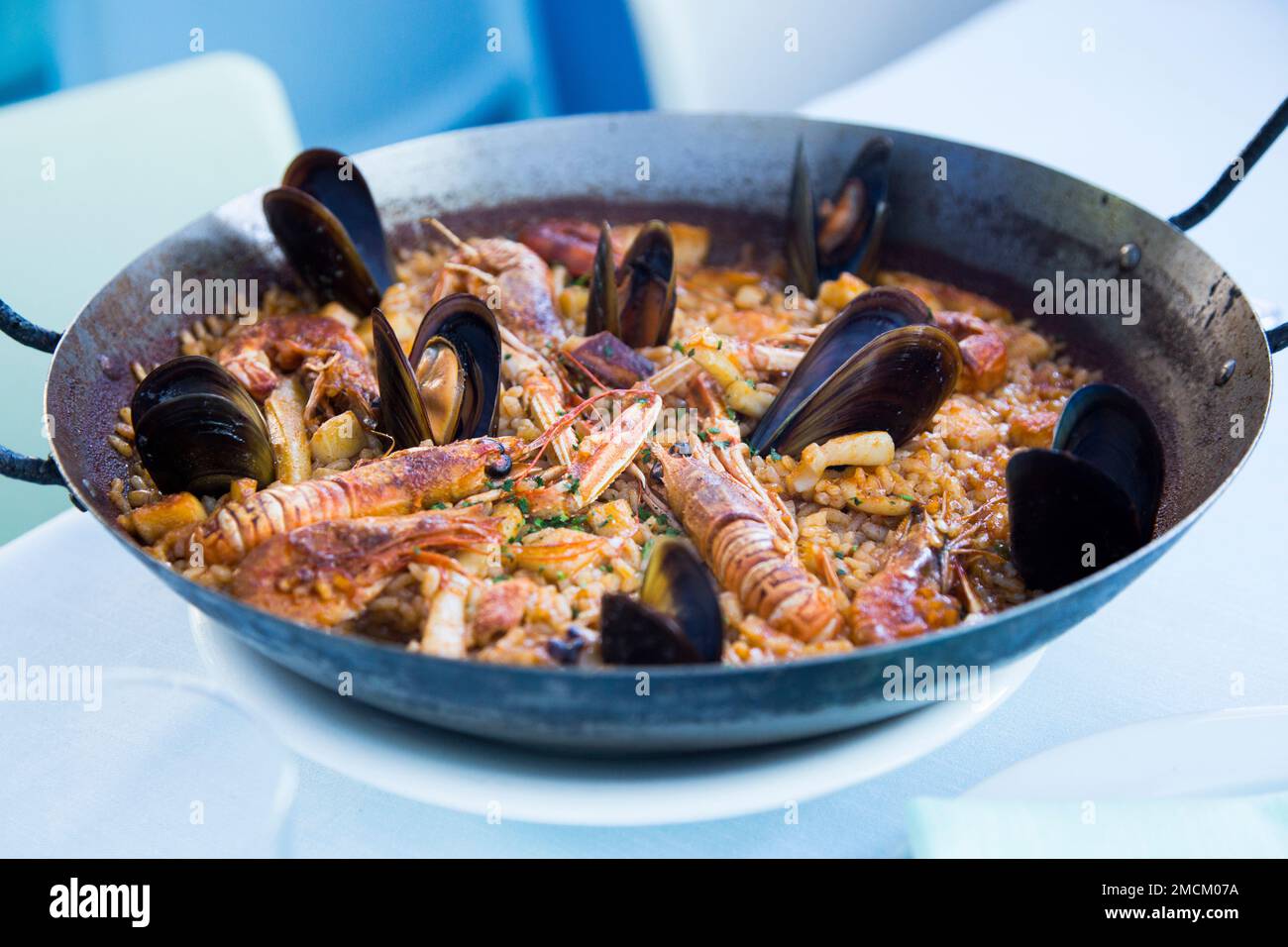 Seafood paella with mussels, prawns and clams. Authentic Paella spanish ...
