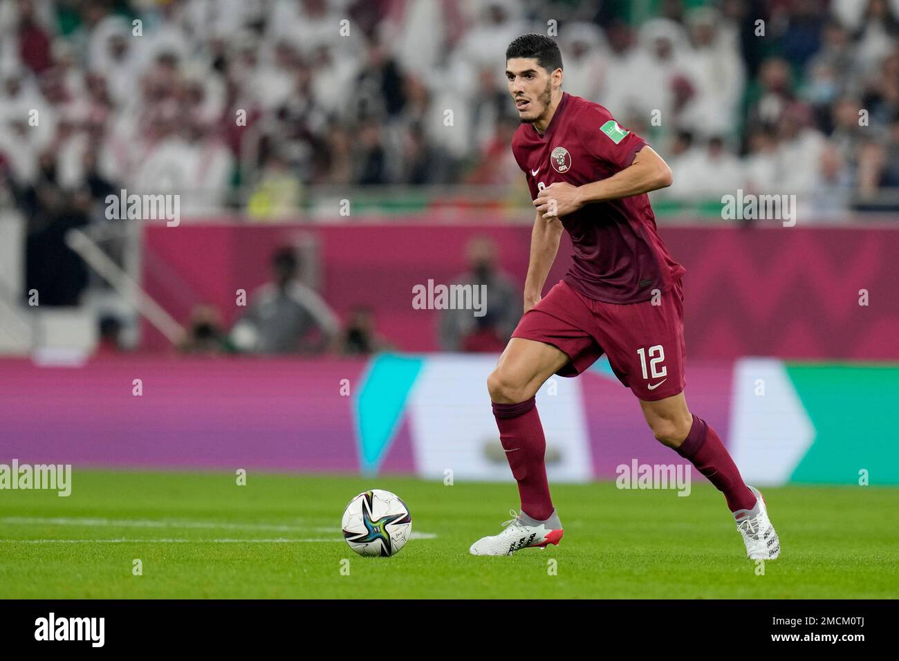 Qatar's Karim Boudiaf is in action during the Arab Cup semifinal soccer ...
