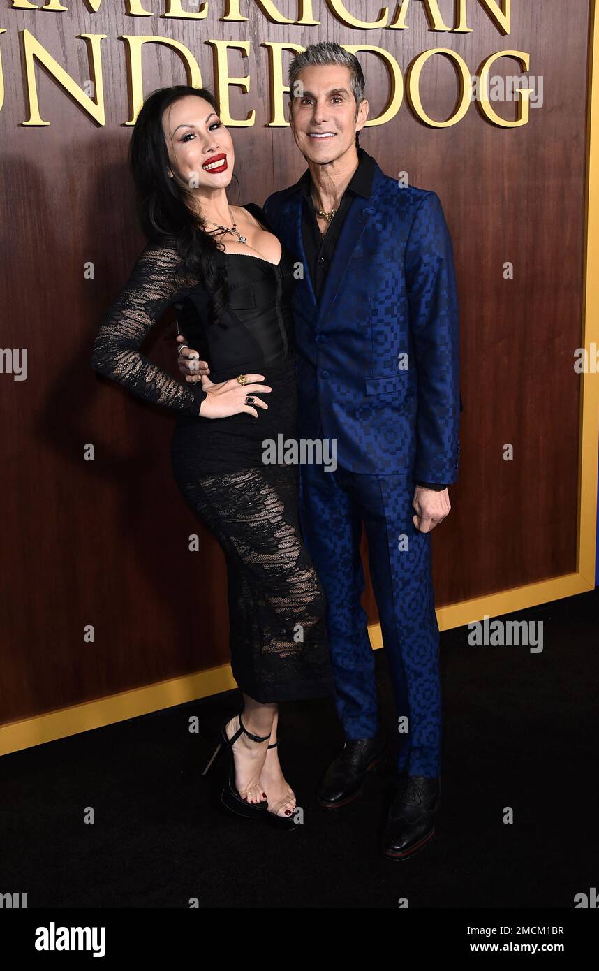 Etty Lau Farrell, left, and Perry Farrell arrive at the premiere of ...