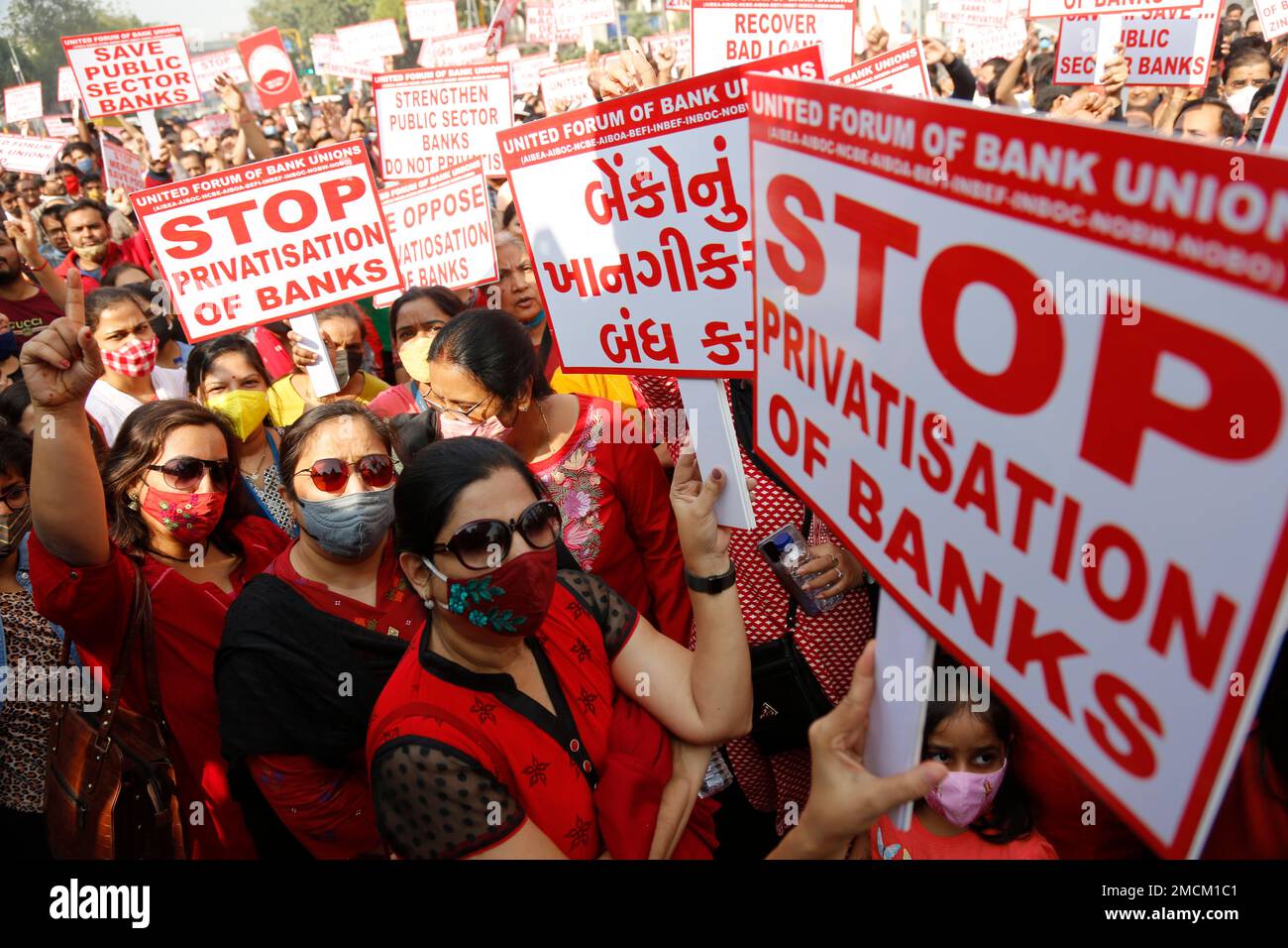 Bank employees shout slogans during a protest rally as part of two day ...
