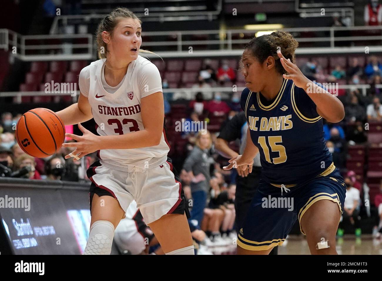 Stanford guard Hannah Jump, left, looks to pass the ball against UC ...