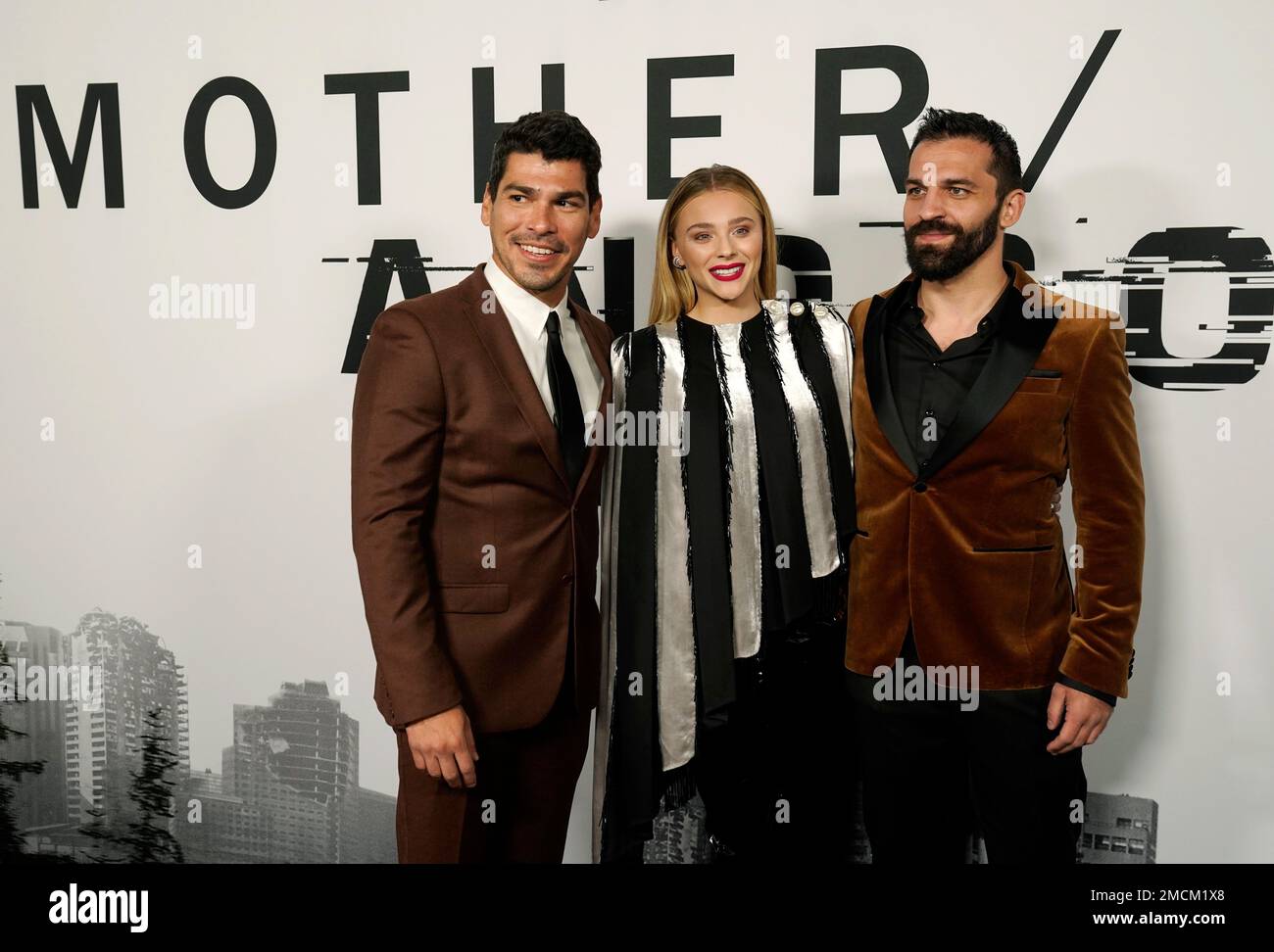 Mattson Tomlin, right, writer/director of "Mother/Android," poses with ...