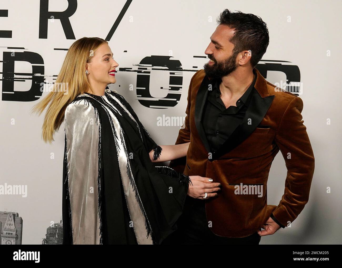 Mattson Tomlin, right, writer/director of "Mother/Android," greets cast ...
